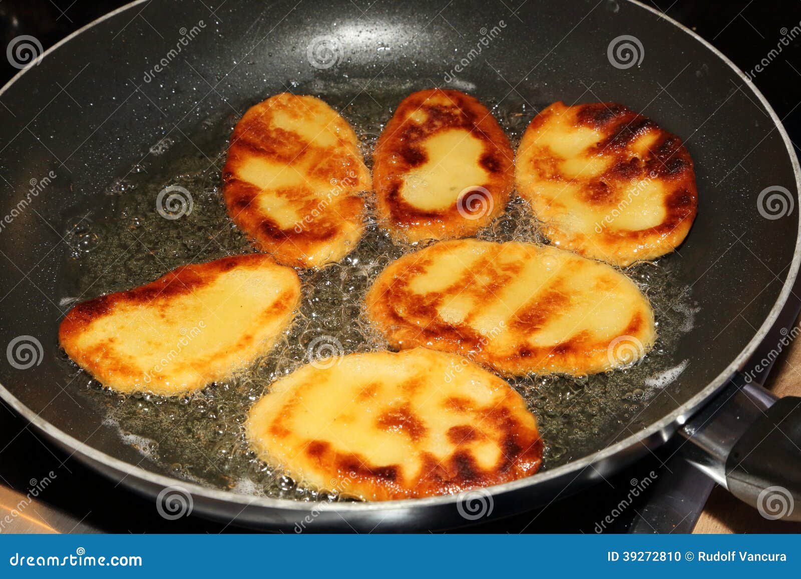 Flat Potato Dumplings Roasting in Hot Oil Stock Photo - Image of grease ...