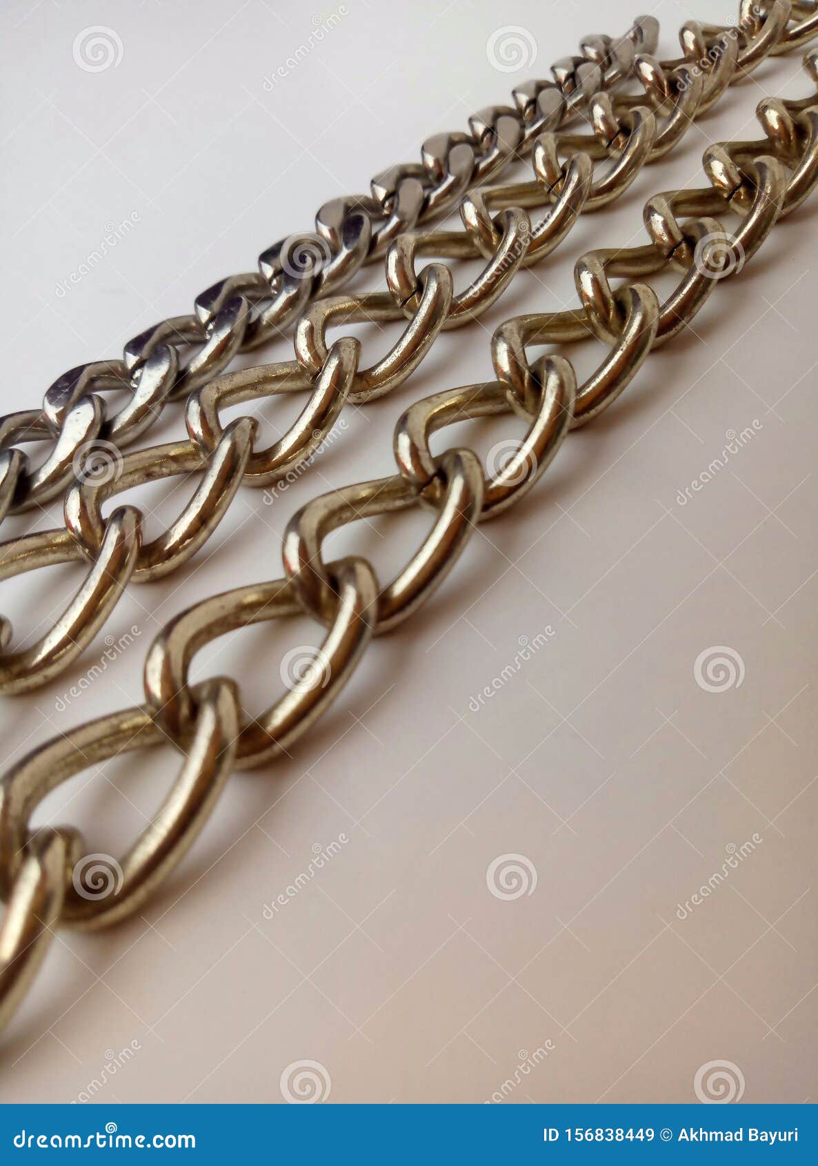 Flat and Round Chains Lined Against an Isolated White Background Stock ...