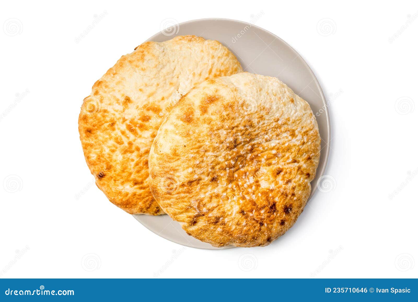 Flat round wheat bread stock photo. Image of clipping - 235710646