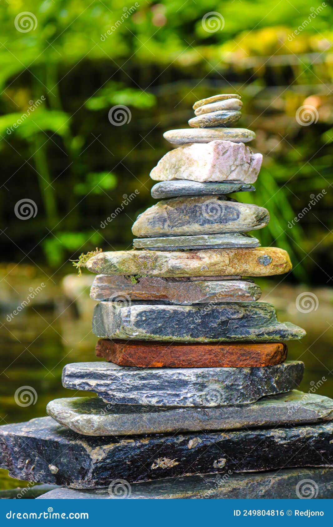 Stack of Stones Piled Up in Forest Setting Stock Photo - Image of ...