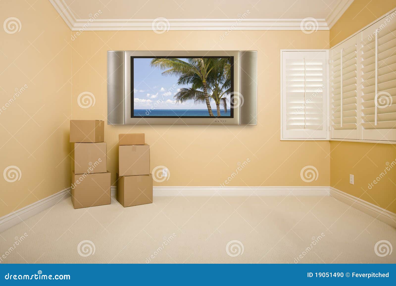 Flat Television on Wall in Empty Room with Boxes Stock Photo - Image of ...