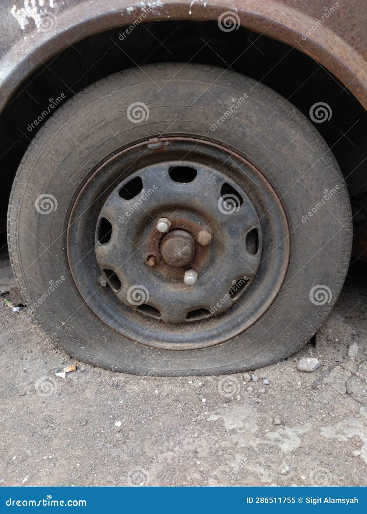 Flat tire car stock image. Image of rusty, dust, wheel - 286511755