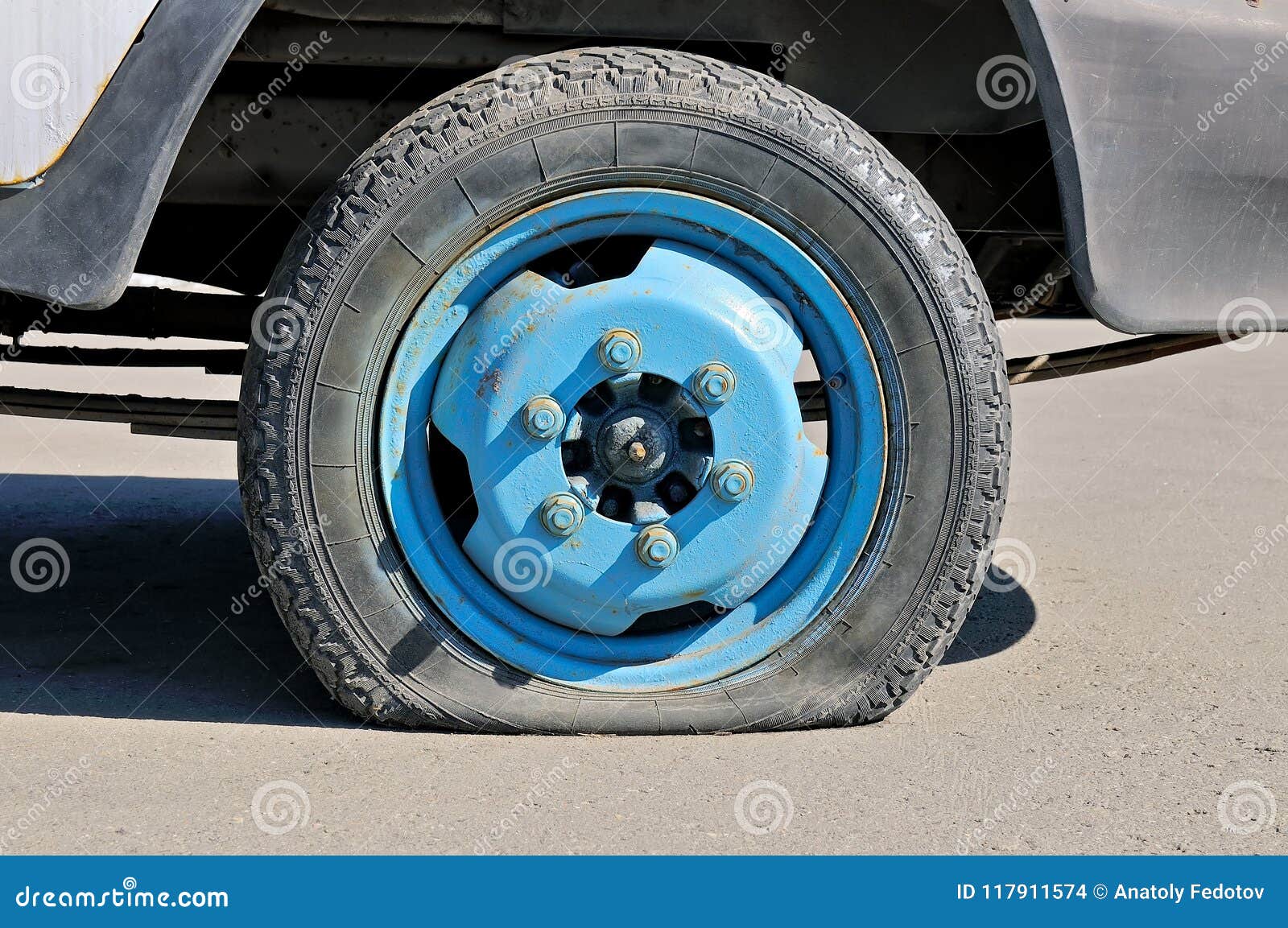 Flat Tire of an Old Rusty Cargo Car. Stock Photo - Image of flat, disc ...