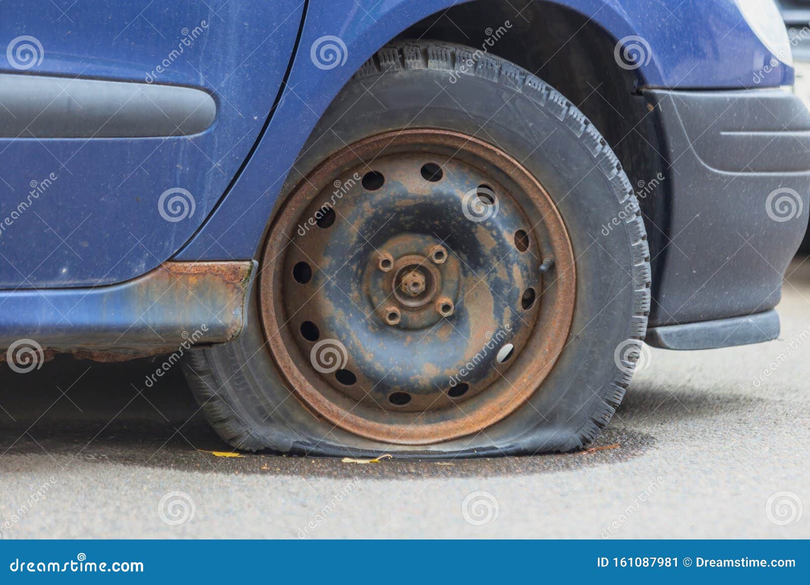 Flat Tire on the Rusty Disc of an Old Car. Stock Image - Image of ...