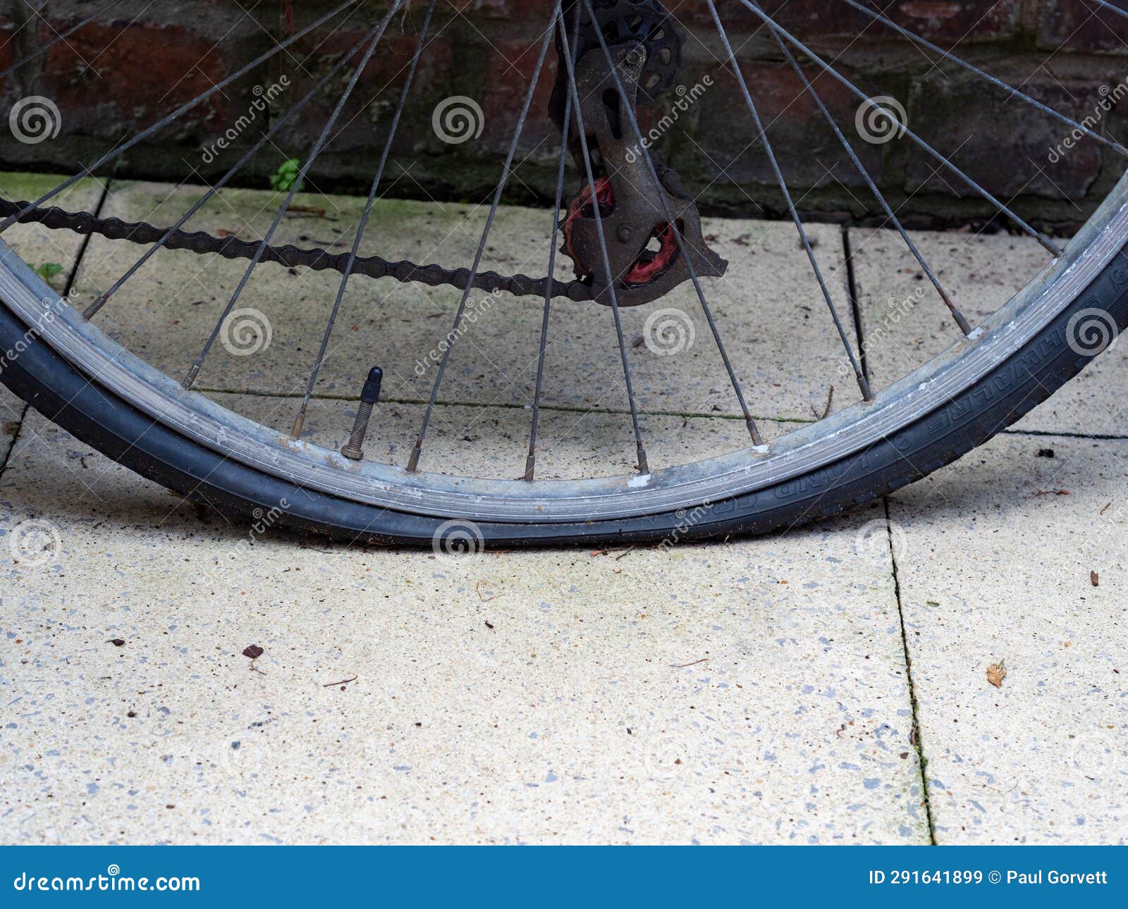Flat Tyre on a Bike by the Road Side Stock Image - Image of street ...