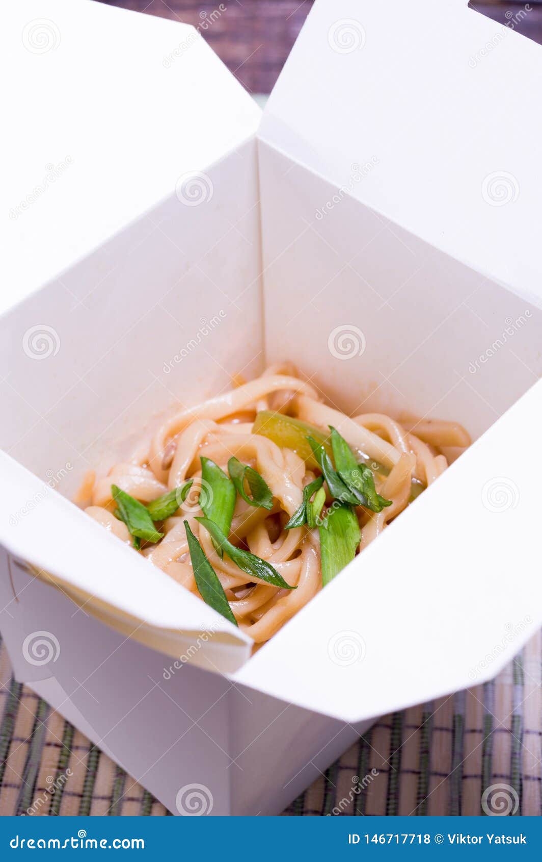 Flat Noodles in a Cardboard Container. Vertical Frame Stock Photo ...