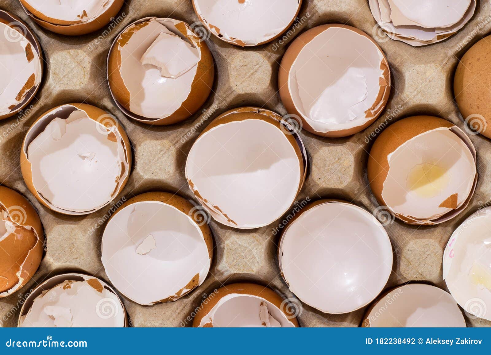 Flat View of a Box with Broken Eggshell Brown Chicken Eggs, Background ...