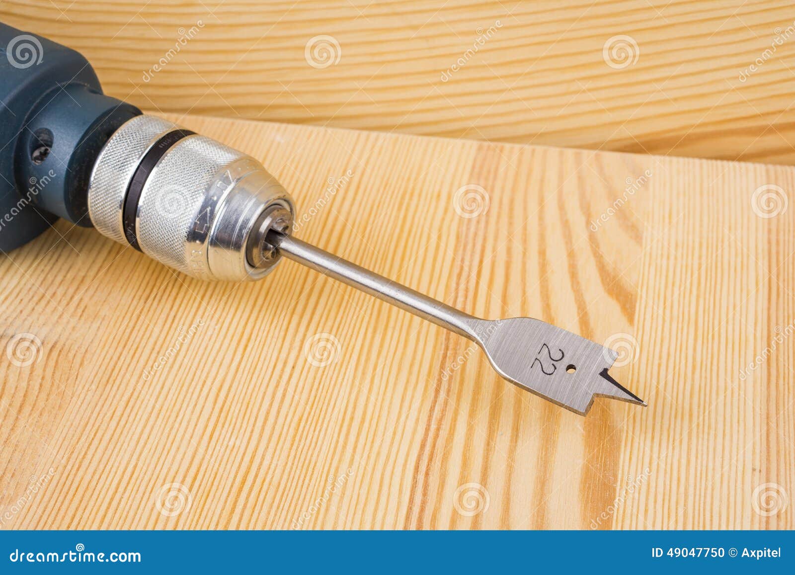 Flat wood bit on drill stock photo. Image of handicraft - 49047750