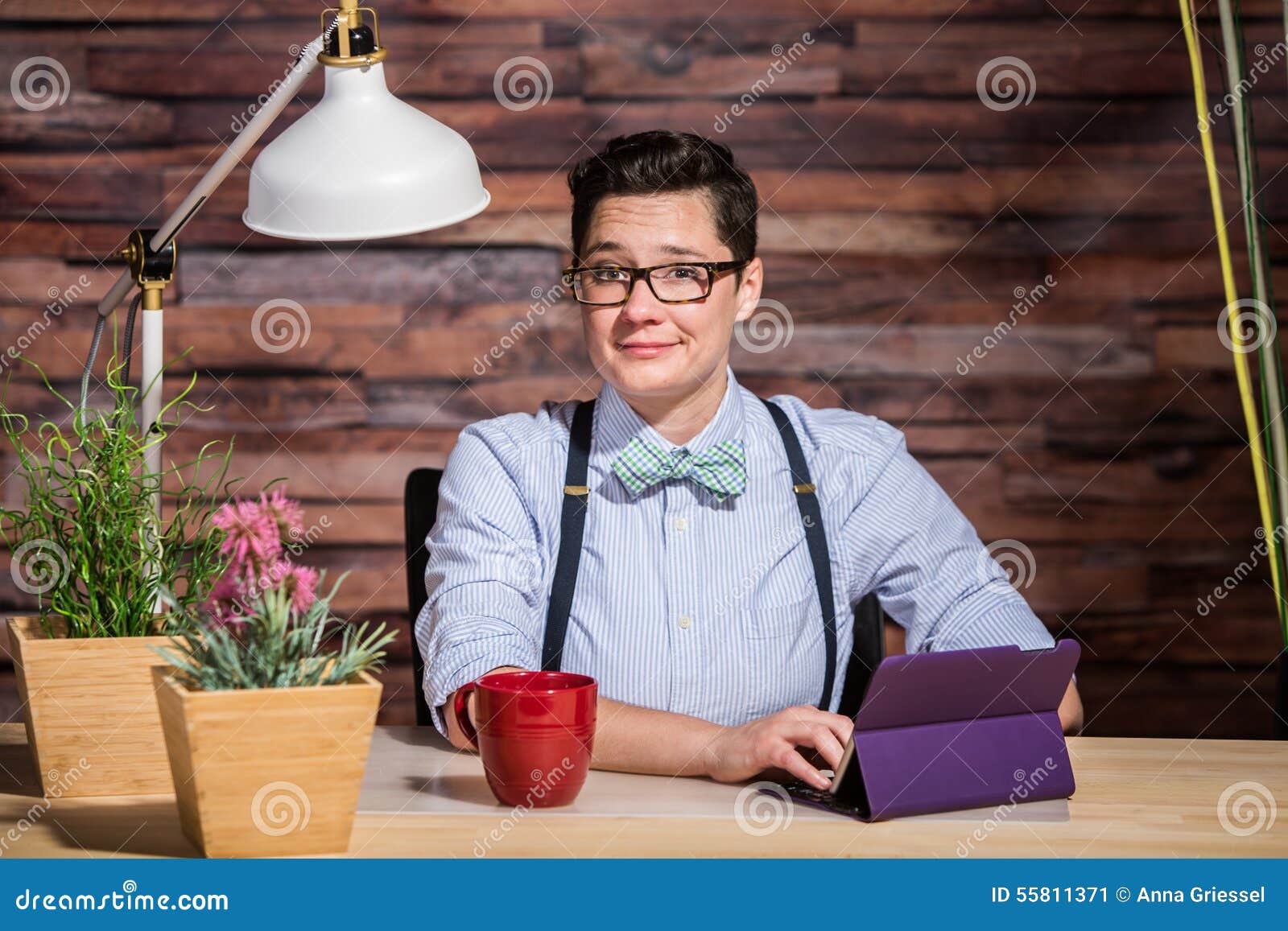 Flattered Woman at Desk stock image. Image of eyeglasses - 55811371