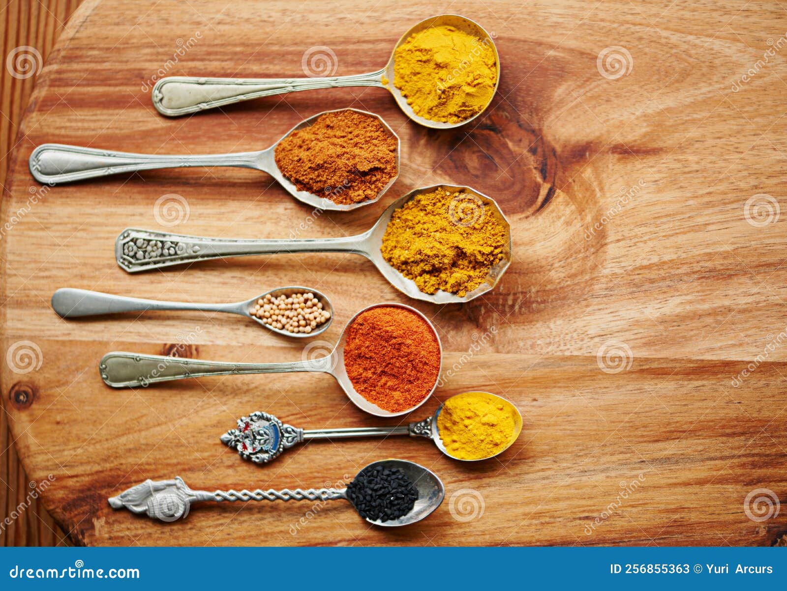 Flavors and Spices. Spoons Filled with a Variety of Spices. Stock Image ...