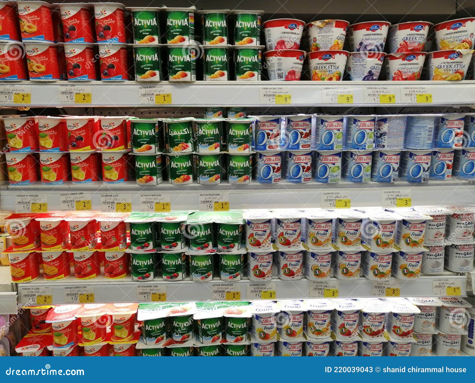 Flavoured yogurt display editorial stock photo. Image of wire - 220039043