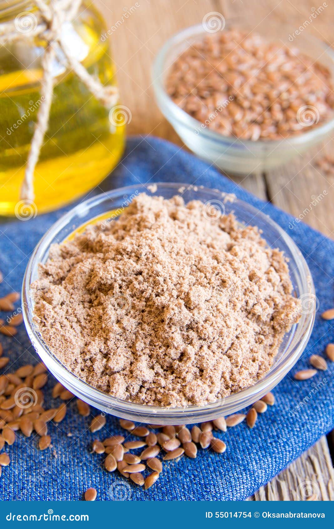 Flax powder and seeds stock photo. Image of flaxseed - 55014754