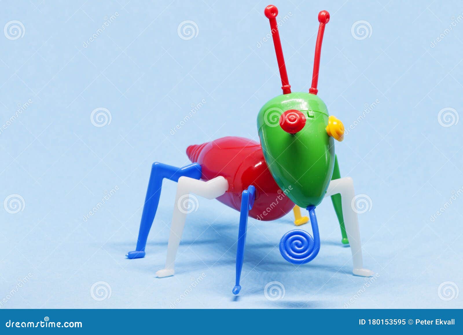 A Flea Like Plastic Toy on Blue Background Stock Image - Image of ...