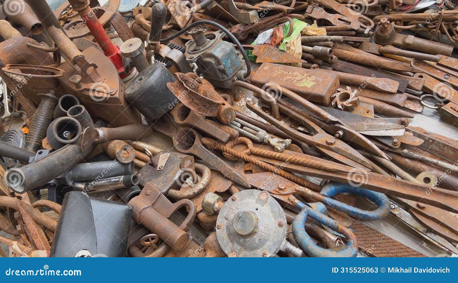 A Flea Market of Old Rusty Things and Tools. Stock Image - Image of ...