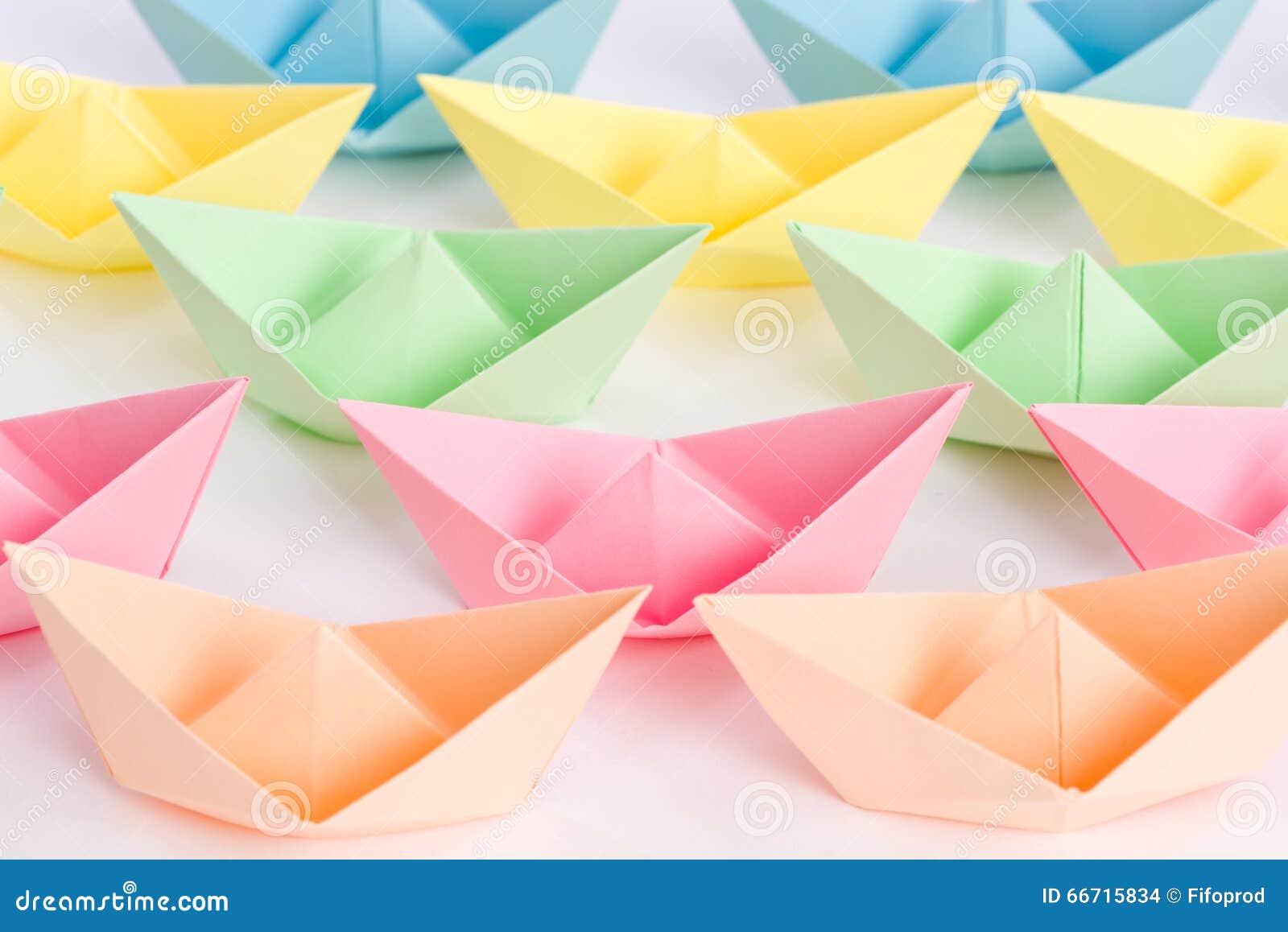 Fleet of Origami Paper Ships Passing by Stock Photo - Image of fleet ...