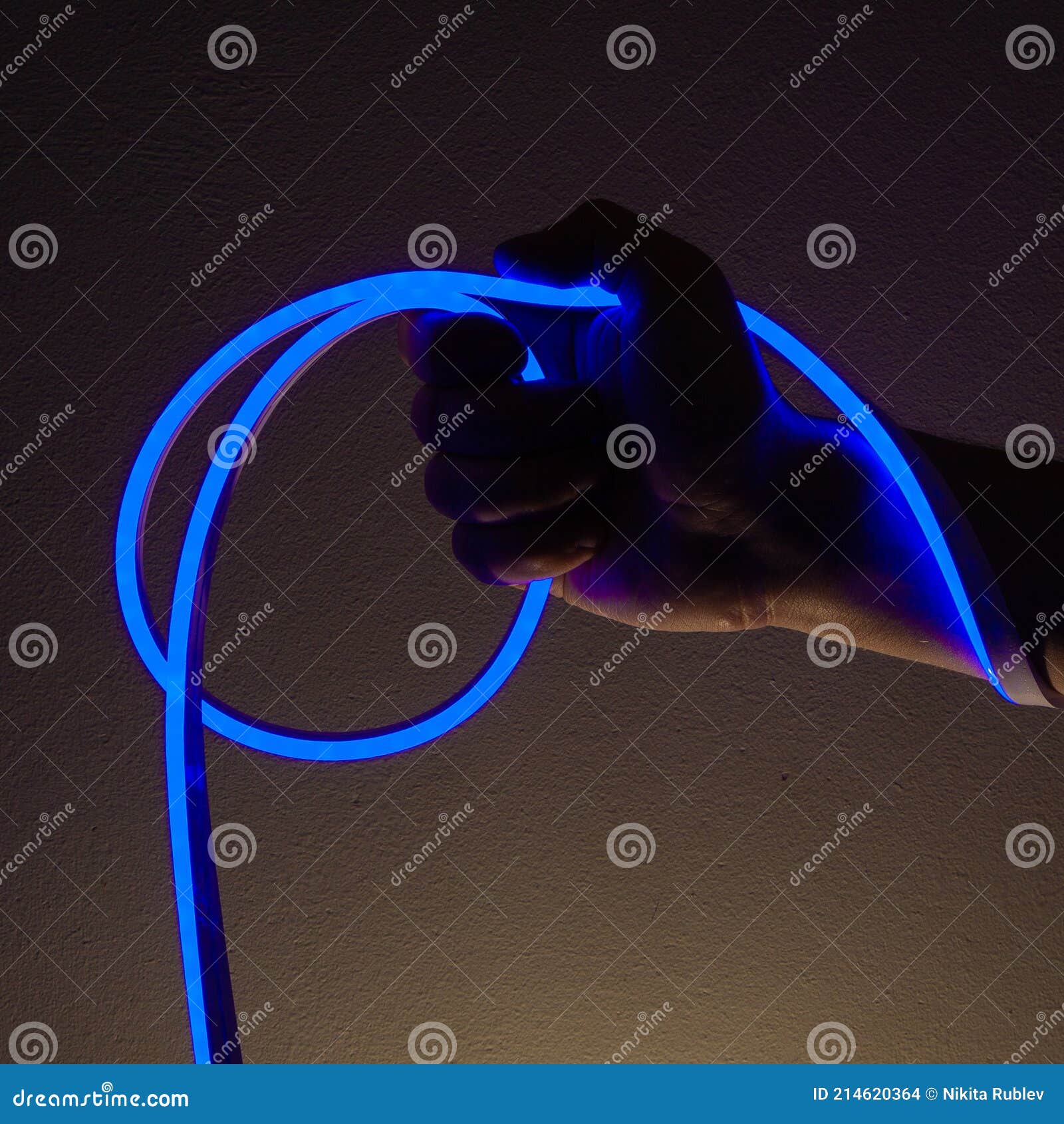 Flexible Blue Led Tape Neon in Hand on Black Background Stock Photo ...