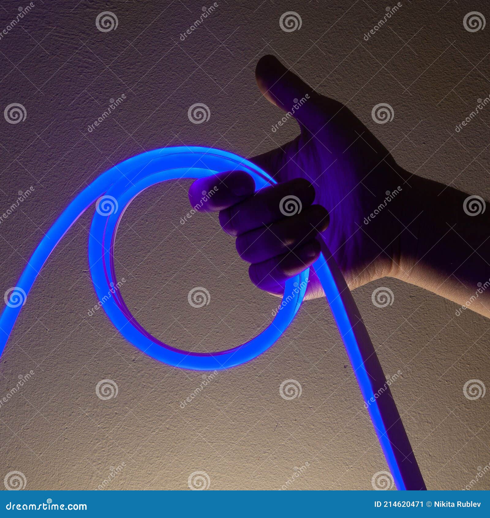 Flexible Blue Led Tape Neon in Hand on Black Background Stock Image ...