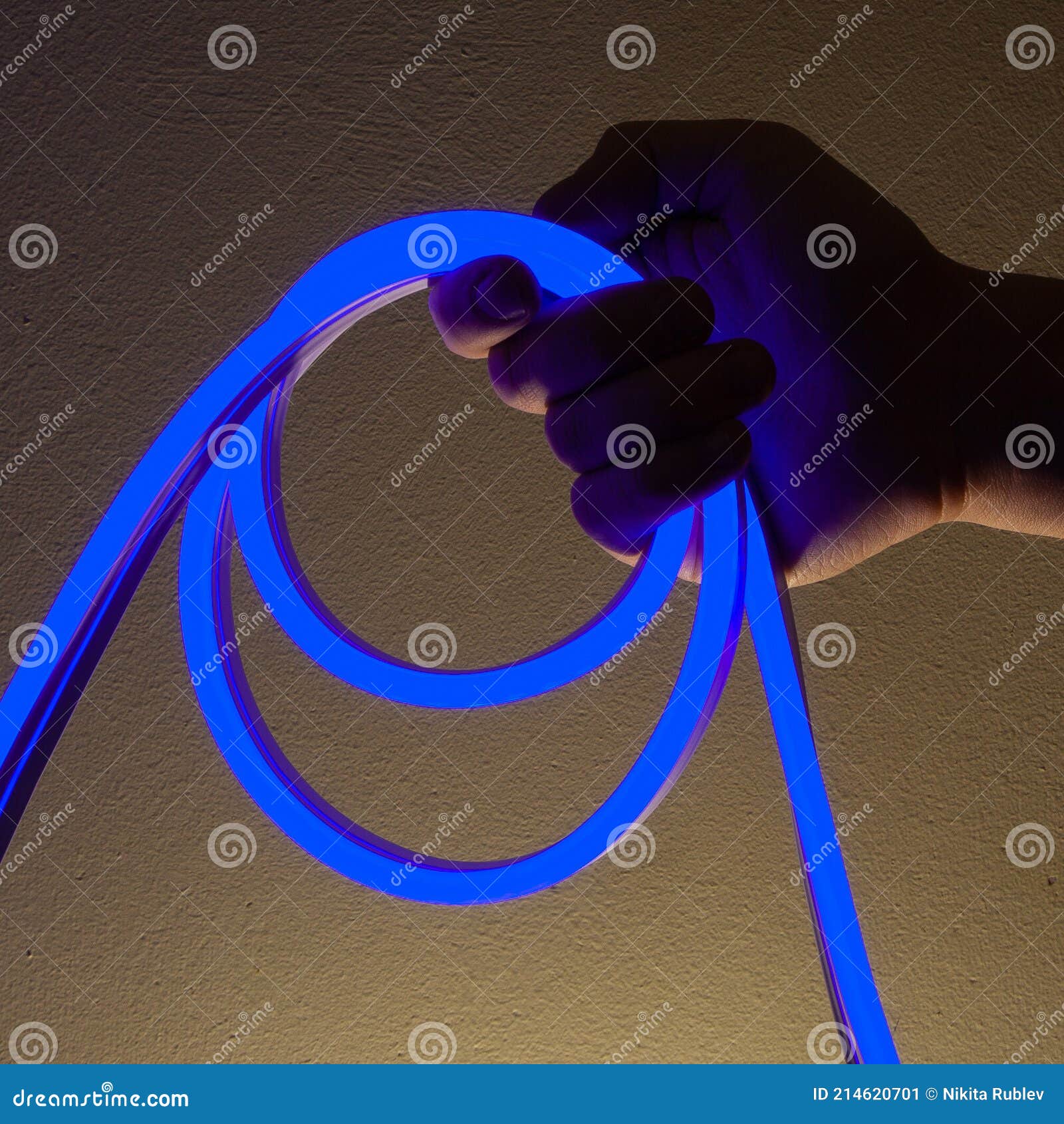Flexible Blue Led Tape Neon in Hand on Black Background Stock Image ...