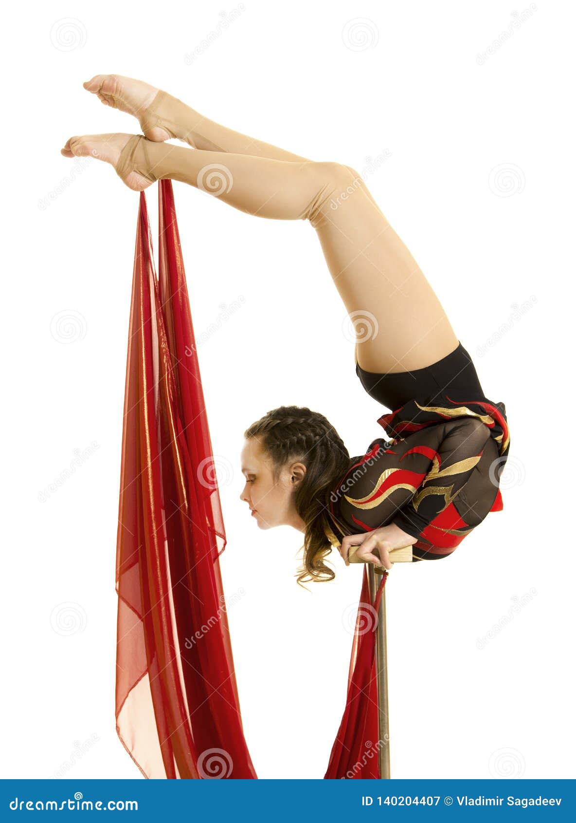 Flexible Equilibrist Performs Exercises on Acrobatic Walking Sticks ...