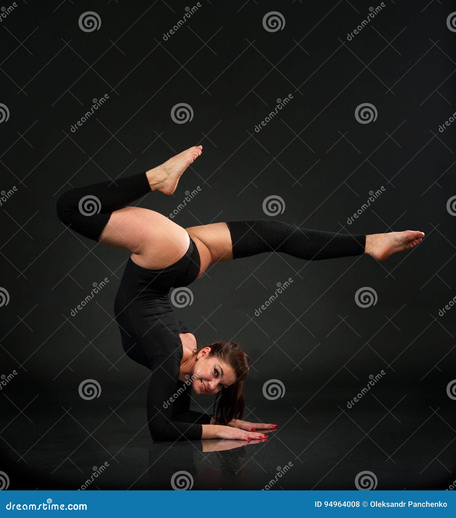 Flexible Gymnast. Girl Makes An Expressive Jump Stock Photography ...