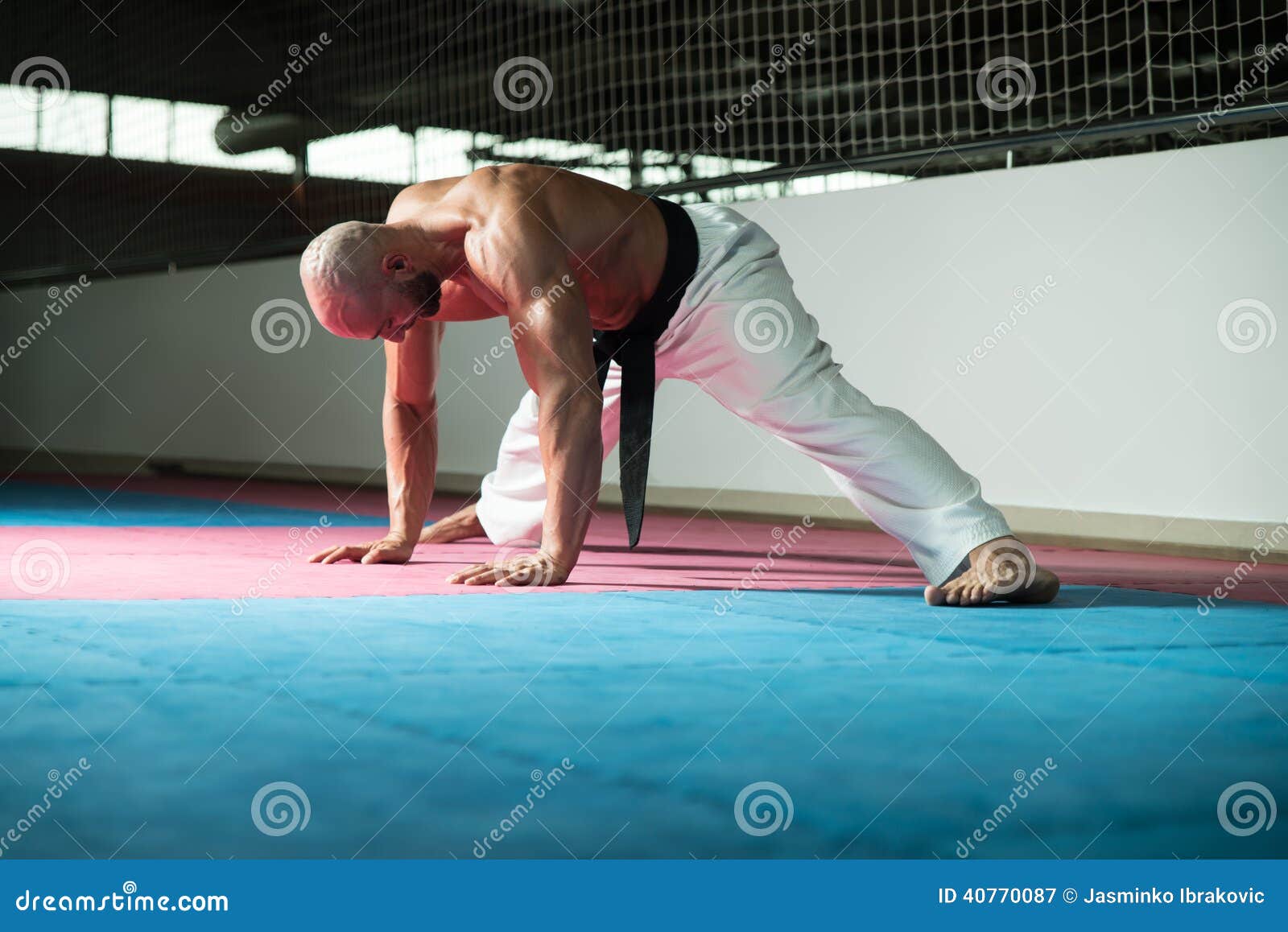 Flexible Man Stretching before Training Stock Image - Image of judo ...