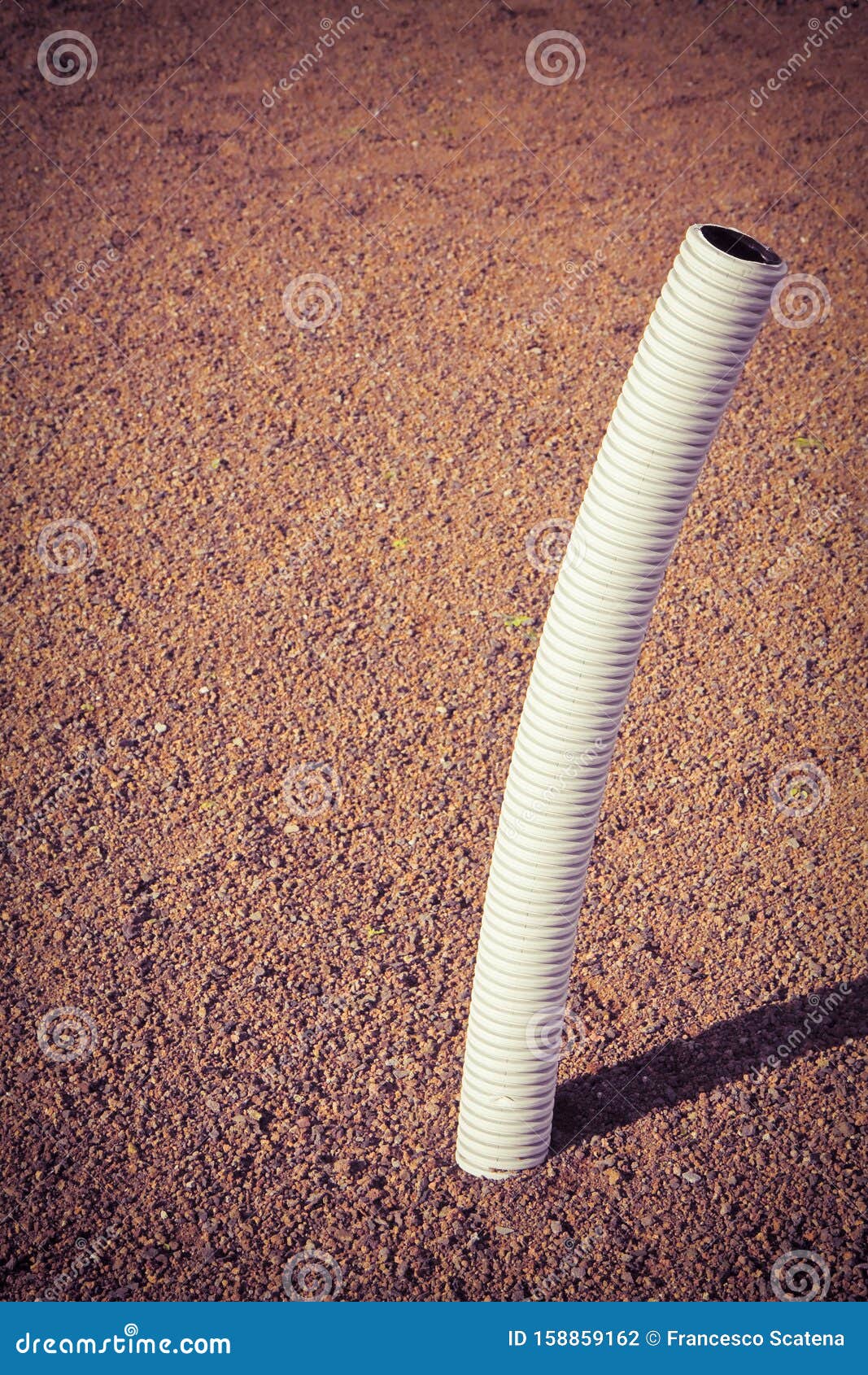 Flexible Plastic Pipe with Electric Cable Coming Out from the Ground ...