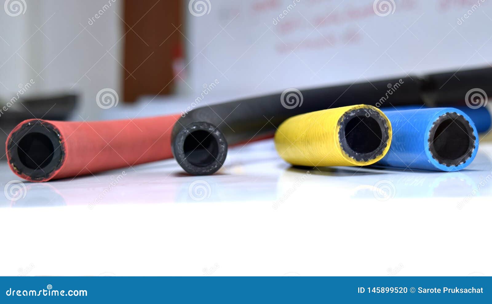 Flexible Rubber Cable on White Background .rubber Products Stock Photo ...