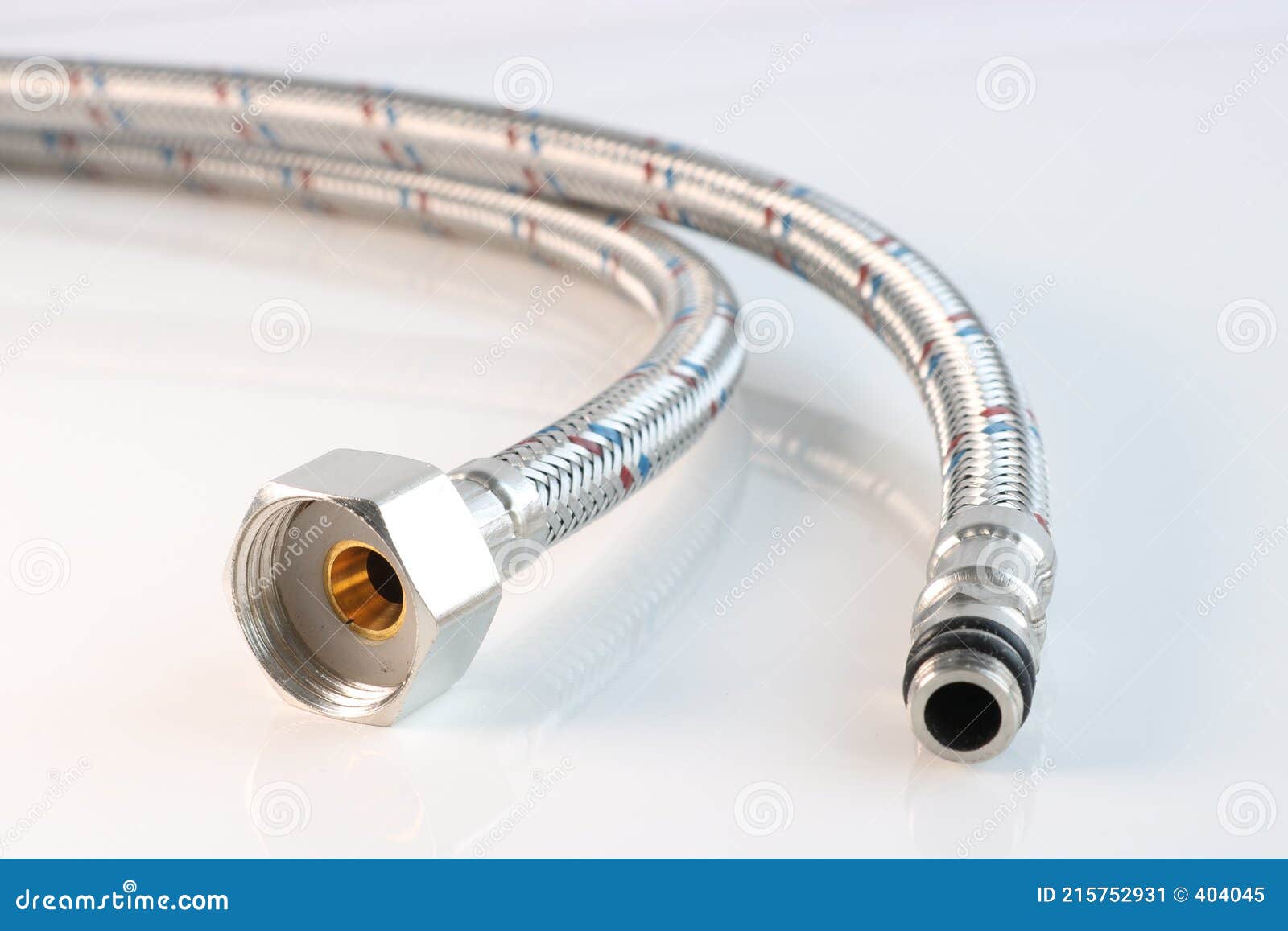 Flexible Water Line with Connections on a Light Background. Plumbing ...