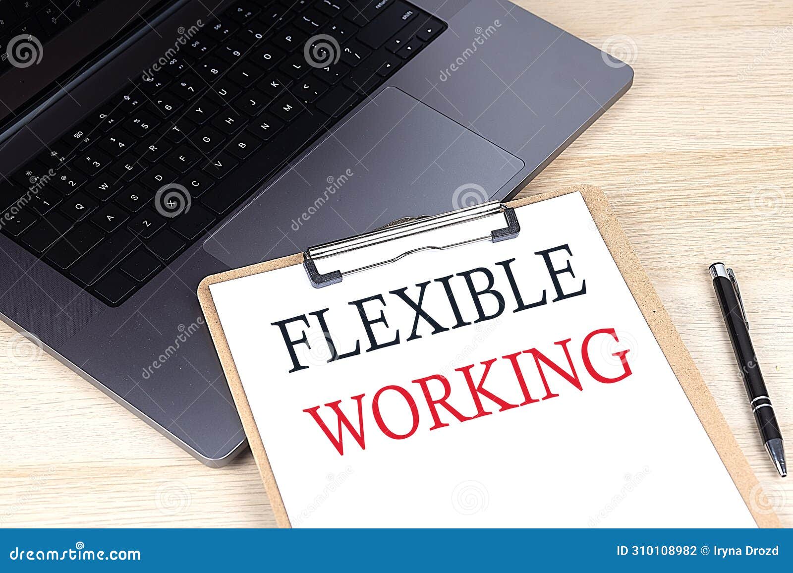 FLEXIBLE WORKING Text Written on a Paper Clipboard on Laptop Stock ...