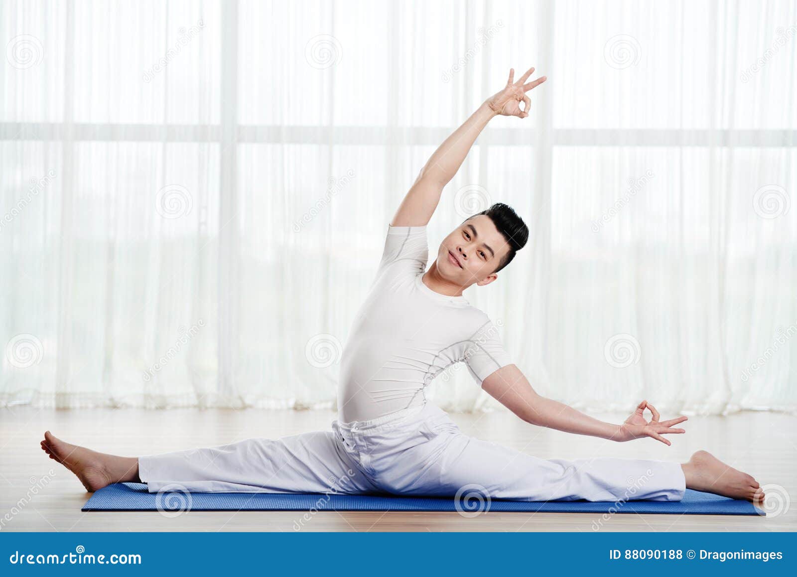 Flexible young man stock photo. Image of workout, vietnamese - 88090188