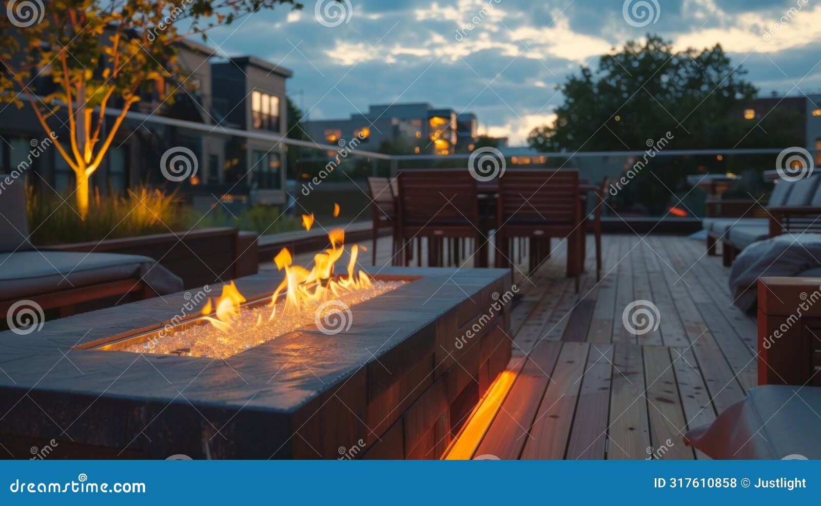 The Flickering Flames of the Fire Pit Provide a Comforting Glow To the ...