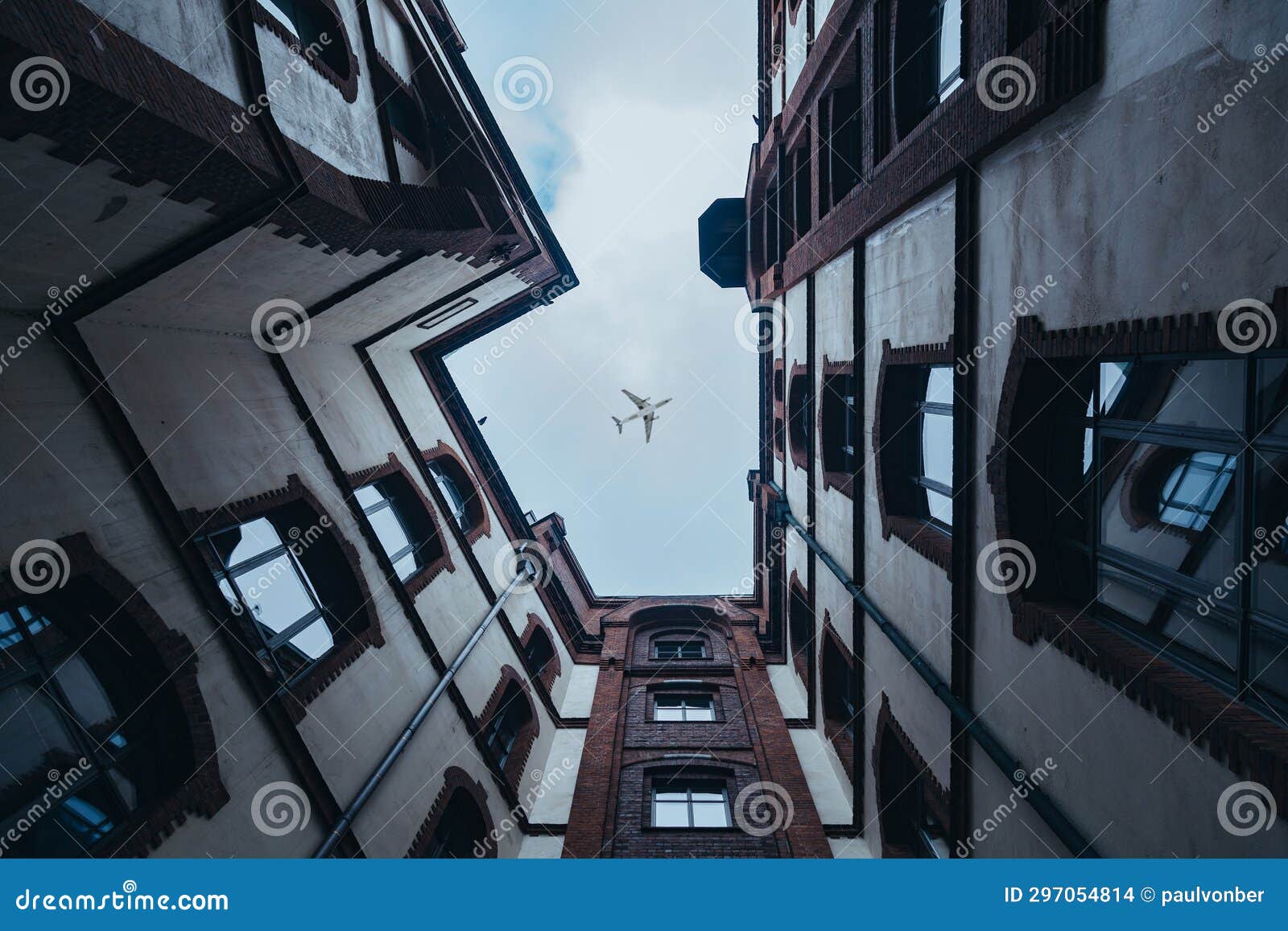Airplane Flight Lookup from Courtyard Stock Photo - Image of cruises ...