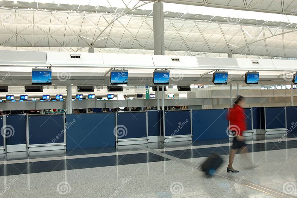 Flight Attendant Walking through the Check-in Counter Stock Image ...