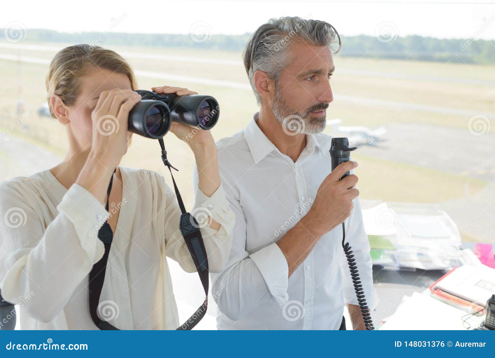 Flight Control Workers in Traffic Control Tower at Airport Stock Photo ...