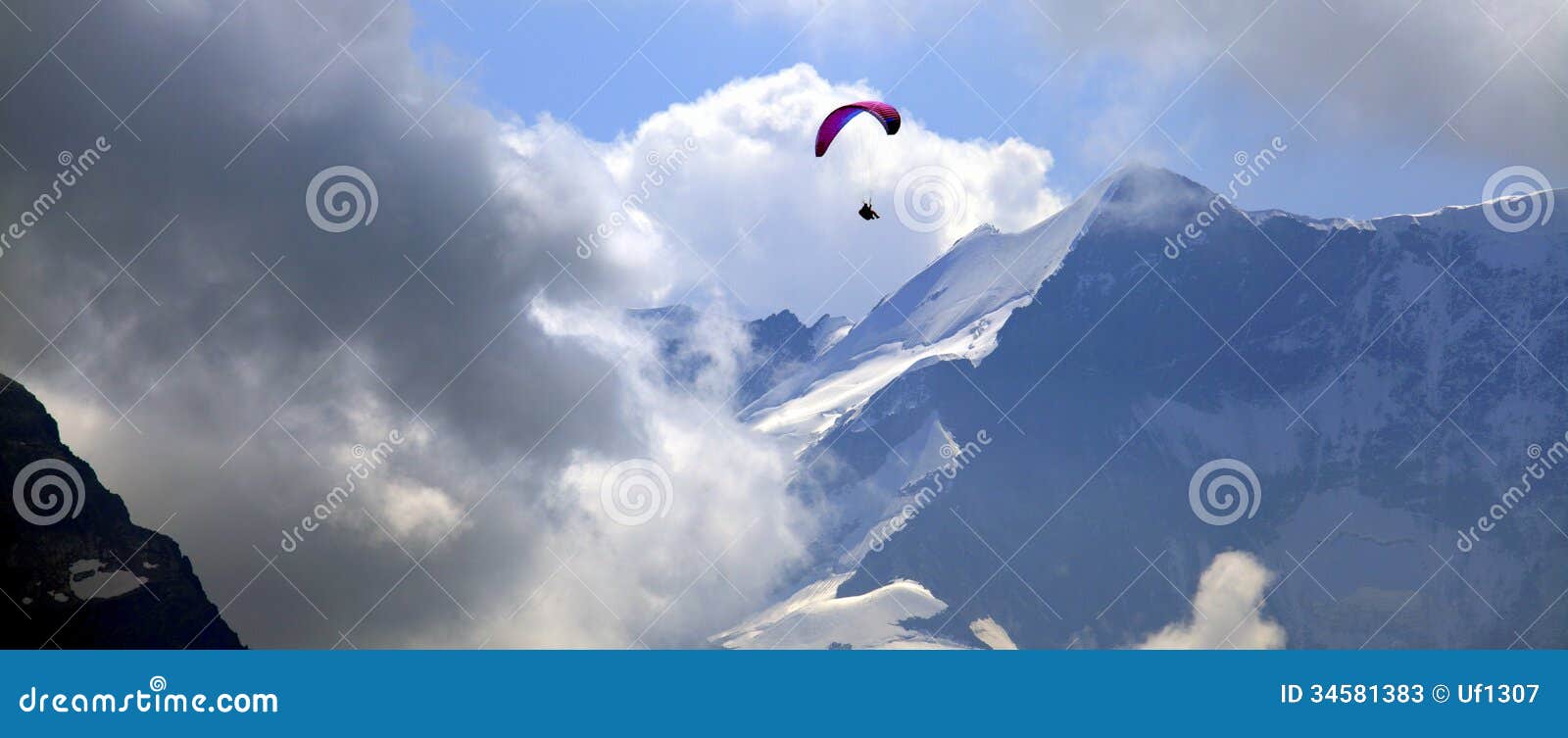 Flight over the Alps stock image. Image of height, clouds - 34581383