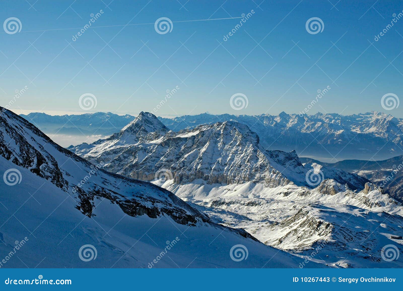 Flight over mountains stock image. Image of airplane - 10267443
