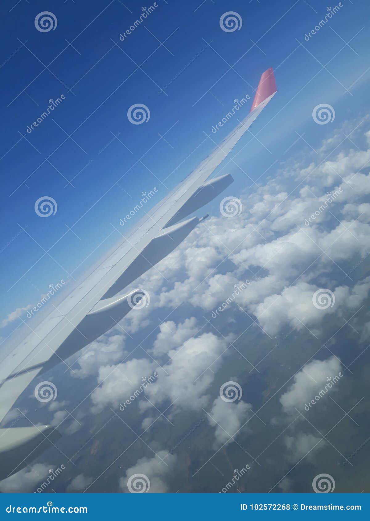 Sky view from plane window stock photo. Image of window - 102572268