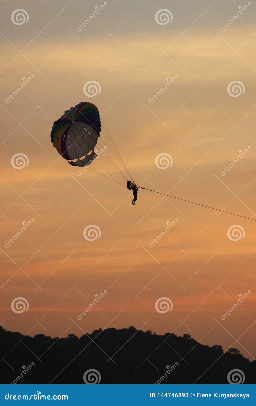 Flight on a Parachute at Sunset Stock Image - Image of cloudlet, eden ...