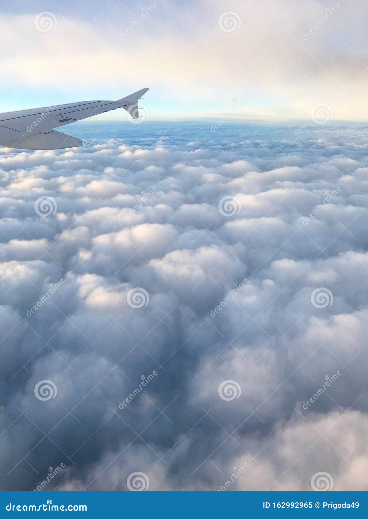 Flight Wing Above Many Gray Clound before the Sunset Stock Image ...