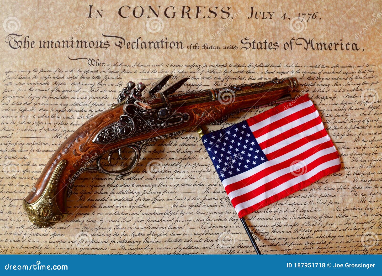 Flintlock Pistol and an American Flag with the Declaration of ...