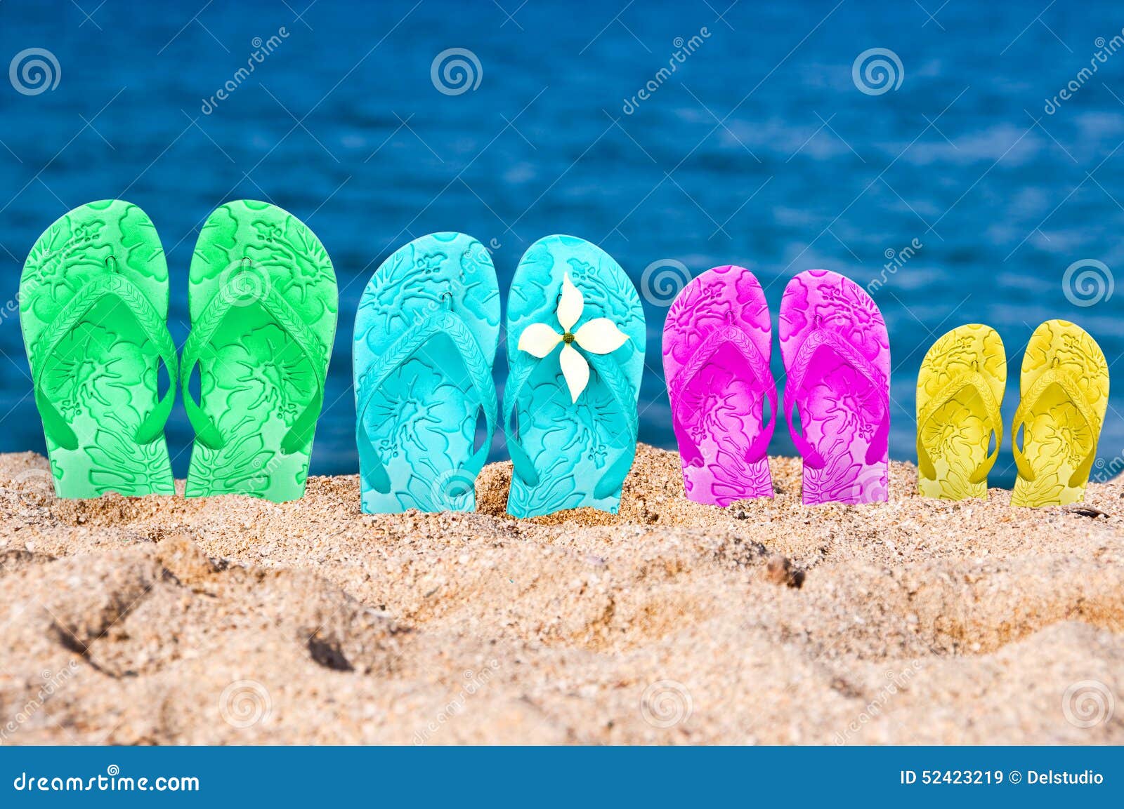 Flip Flops of a Family of Four in the Sand Stock Image - Image of shoe ...