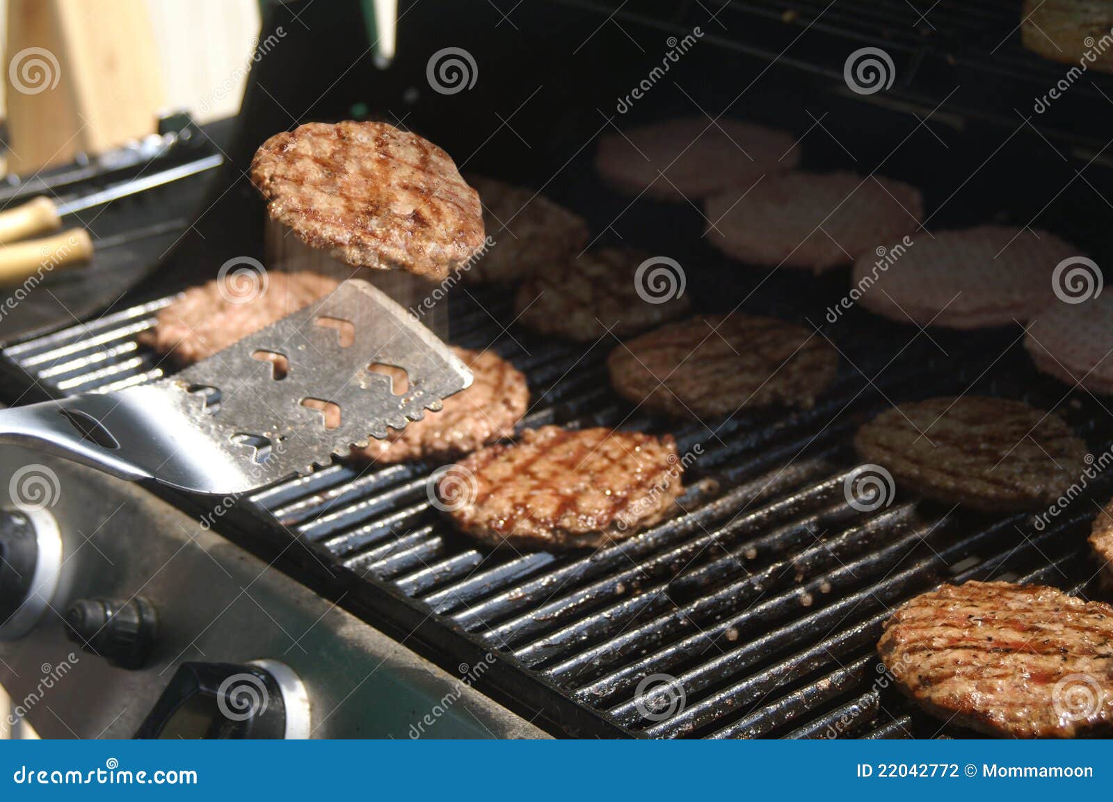 Flipping Burgers on the Grill Stock Photo - Image of nutrition, burger ...