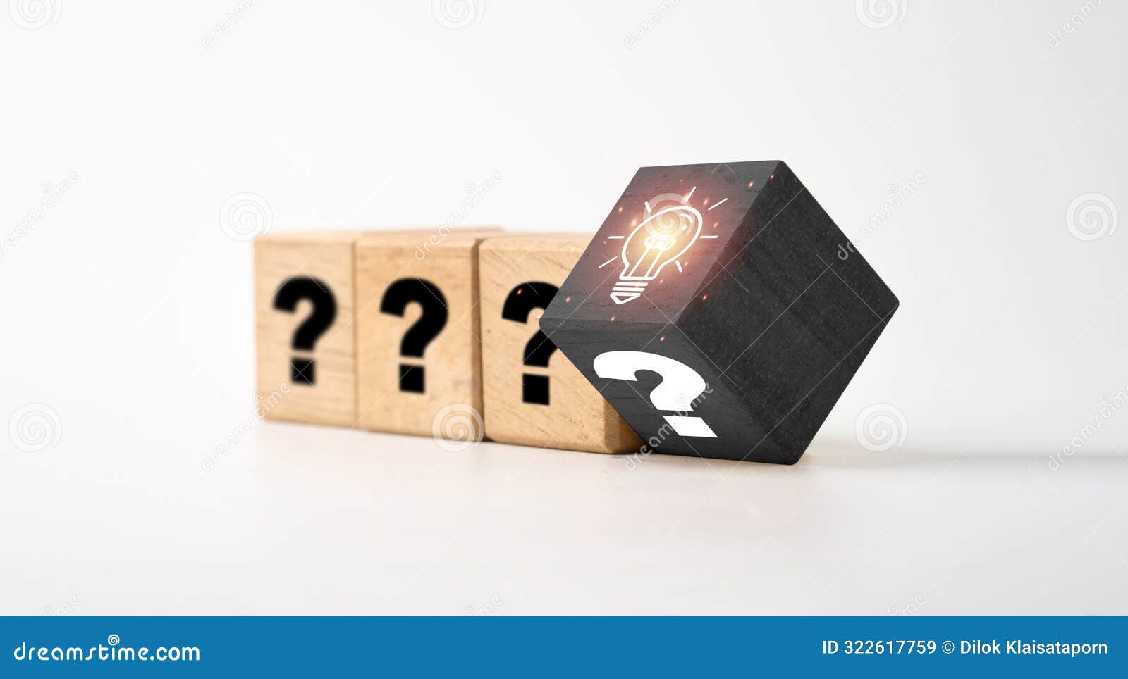 Flipping of Glowing Lightbulb and Question Mark on Black Wooden Cube ...