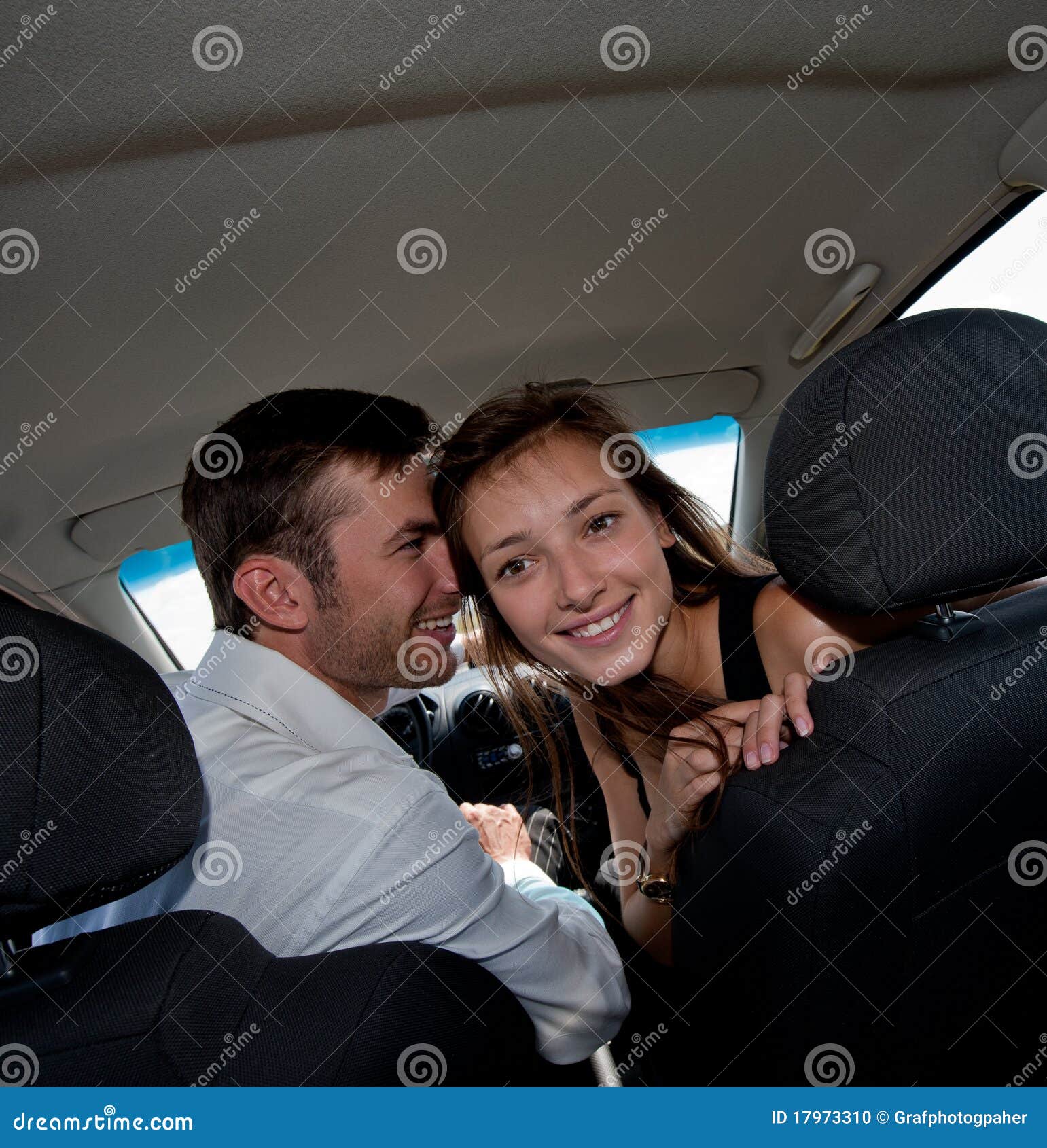Flirtation in the car stock photo. Image of automobile - 17973310