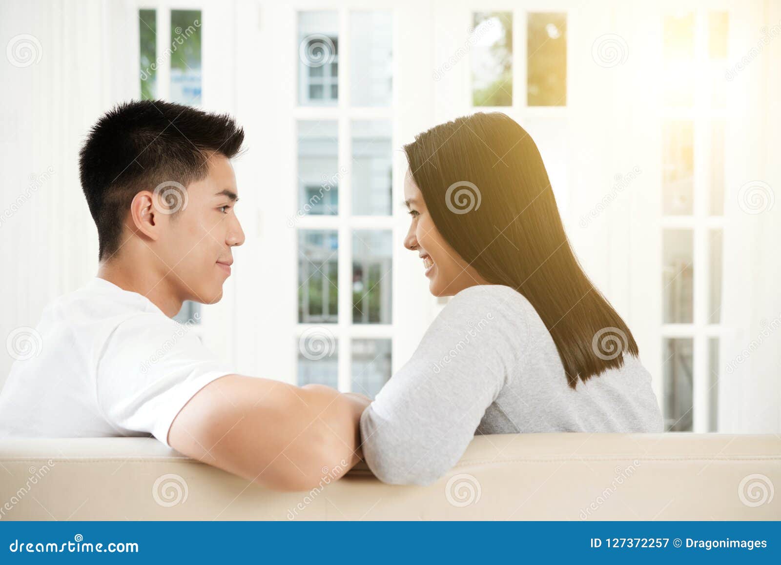 Flirting couple stock image. Image of valentines, mixedrace - 127372257