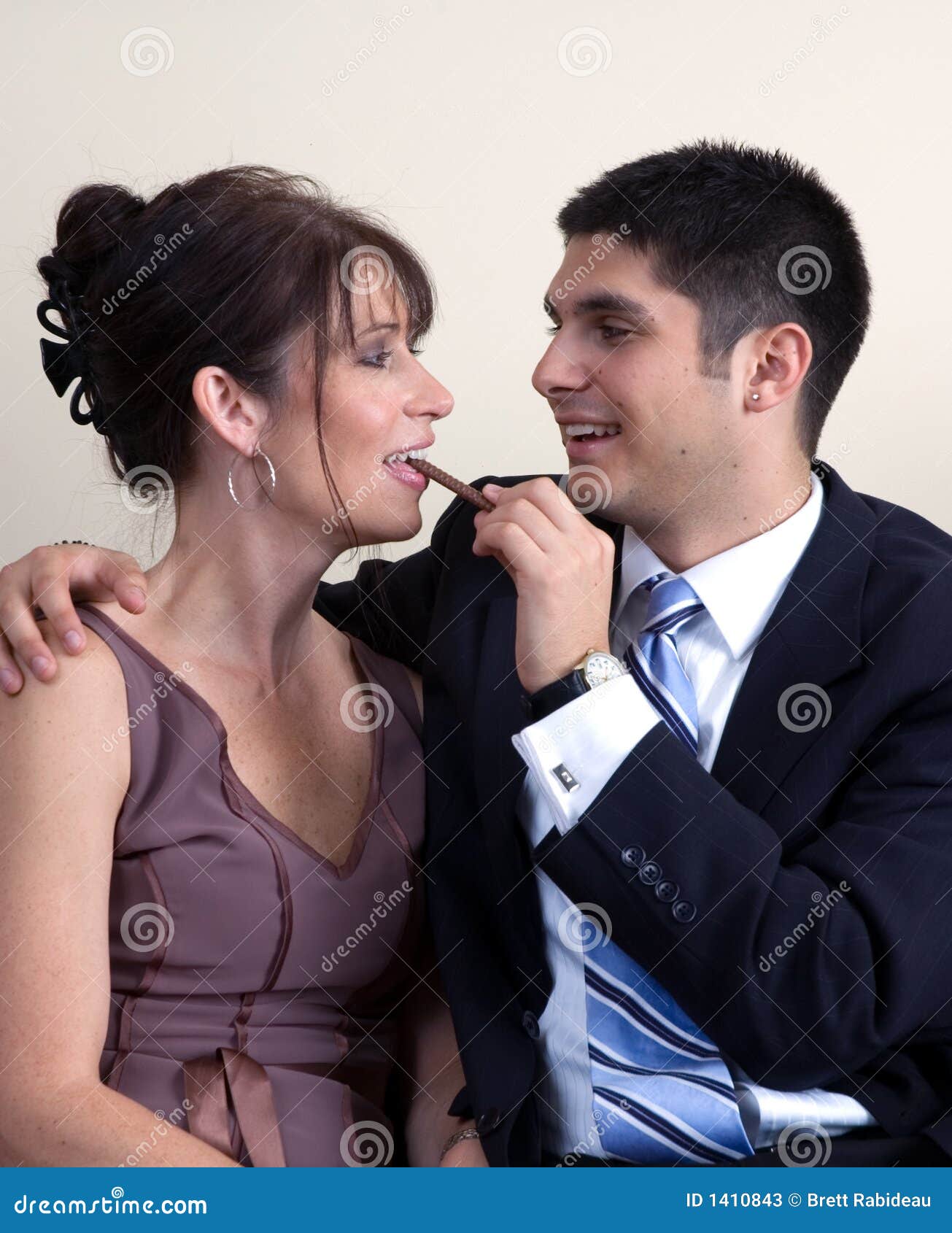 Flirting Formal Couple with Chocolate Stock Image - Image of dating ...