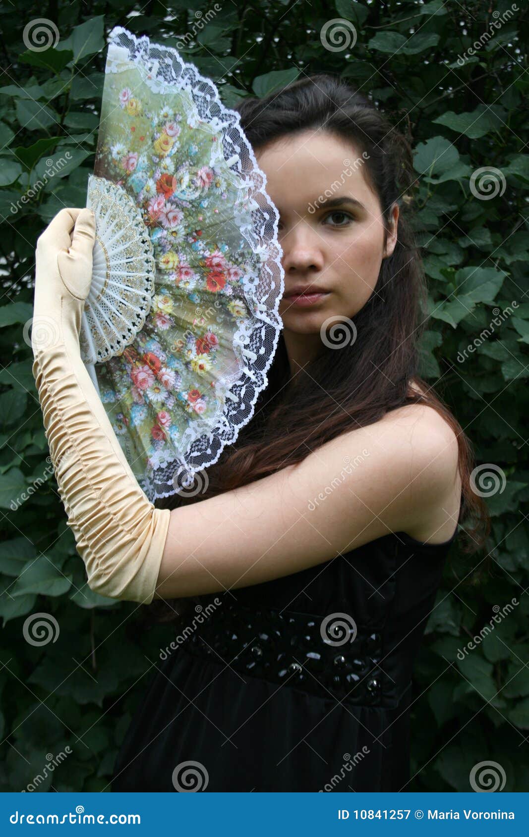 Flirting girl with a fan stock image. Image of grace - 10841257