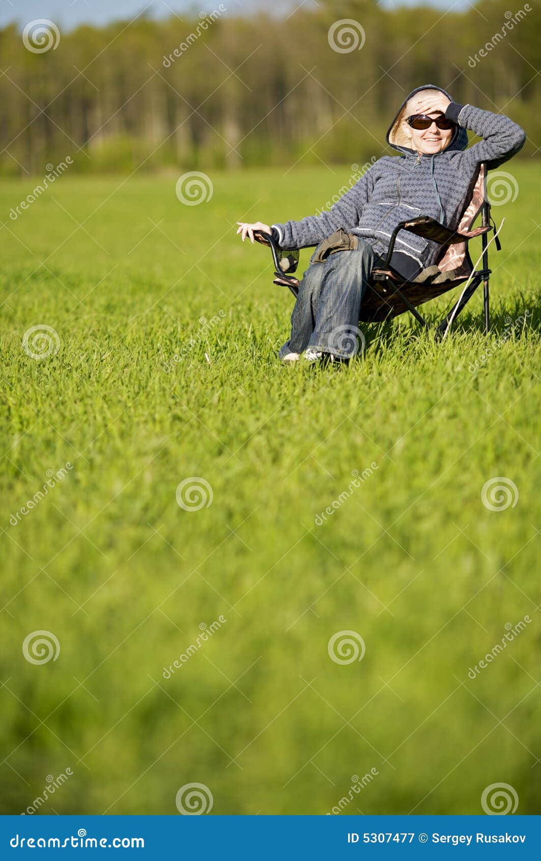 Floar sits stock image. Image of enjoy, outdoors, grass - 5307477