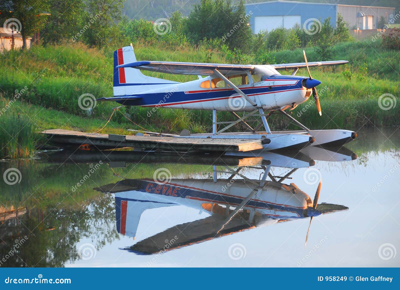 Float plane stock image. Image of sunrise, dock, lakes - 958249