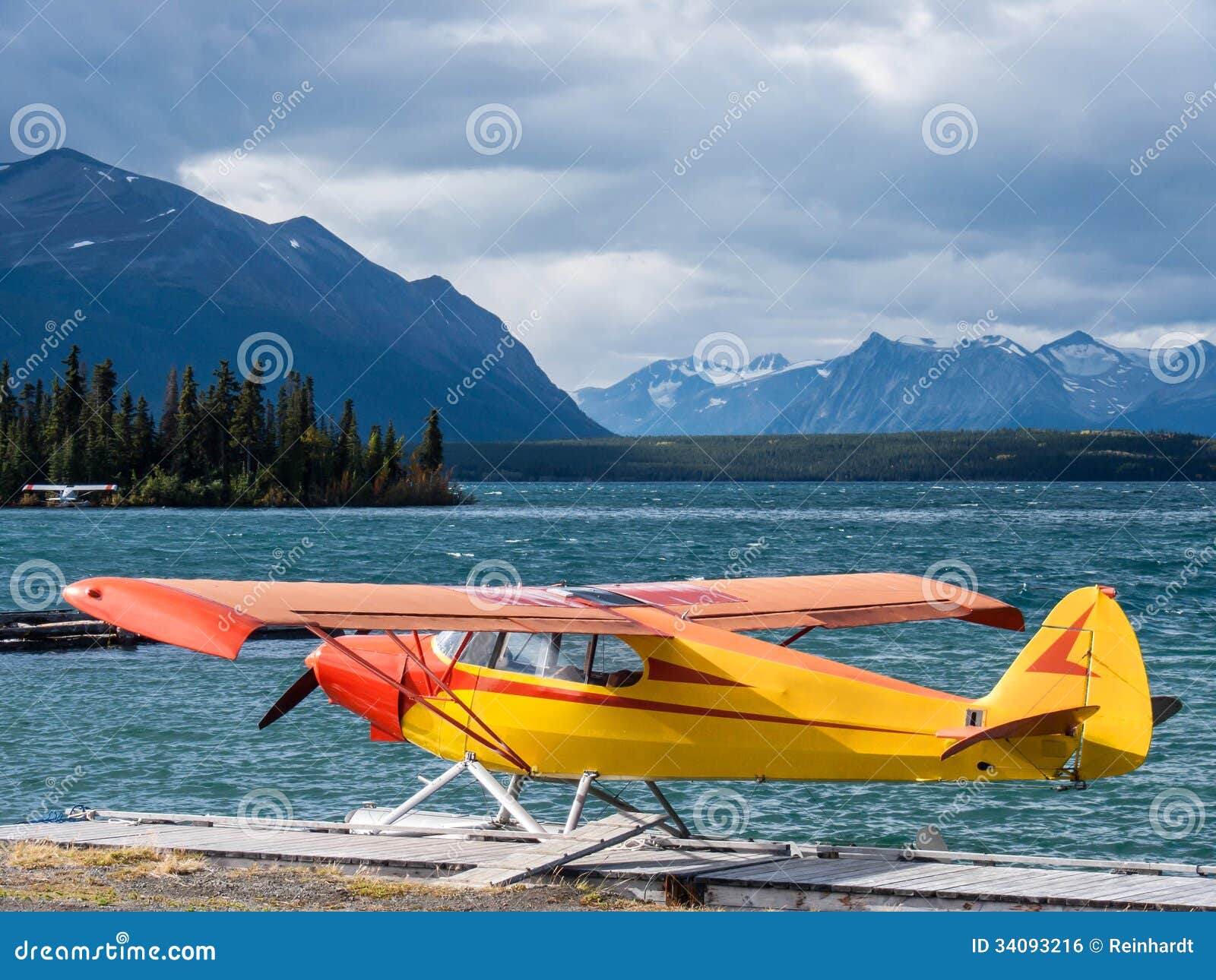Float plane on lake stock photo. Image of aircraft, blue - 34093216